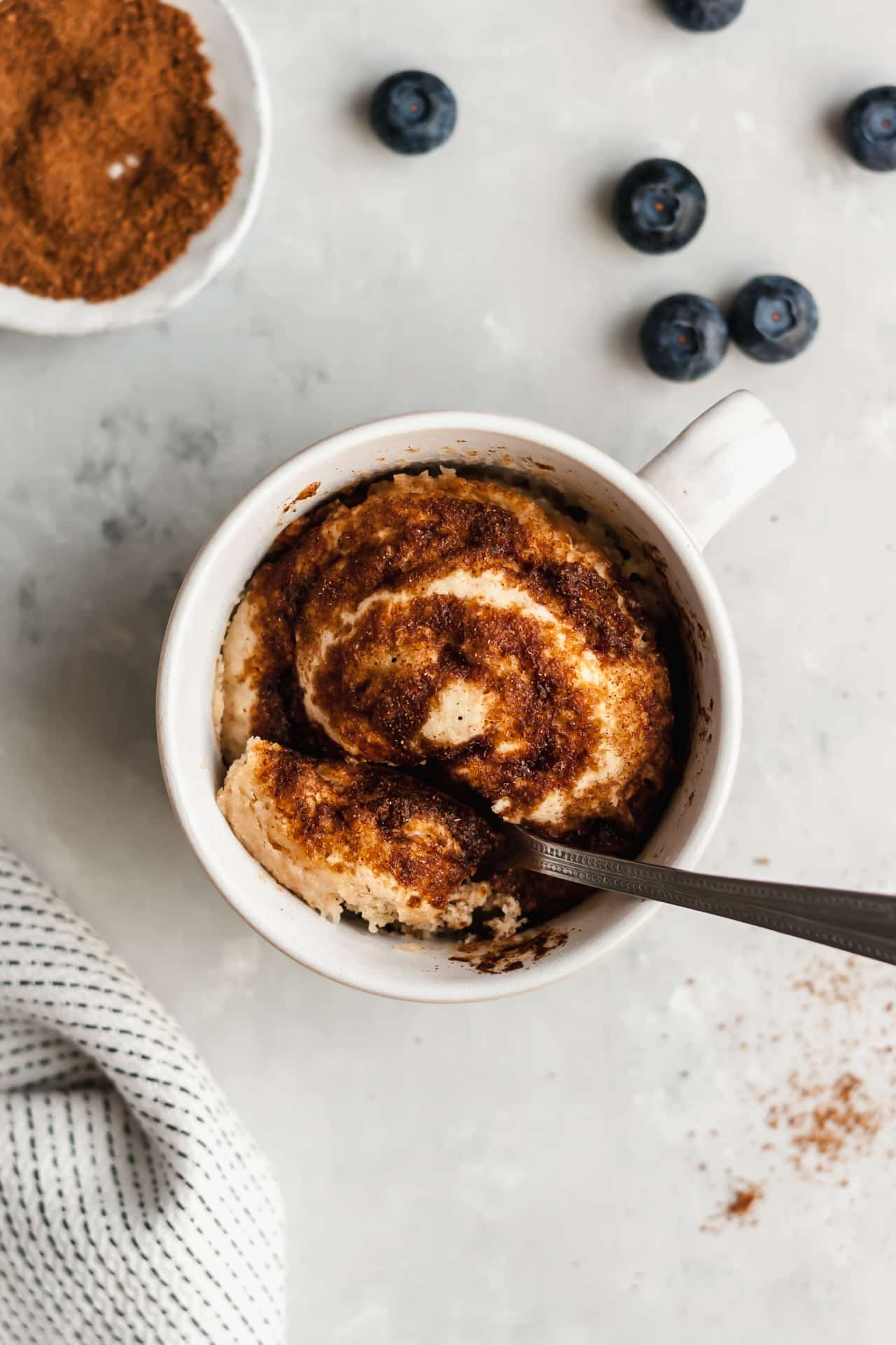 Cinnamon Roll Microwave Mug Cake Recipe - Kim's Cravings